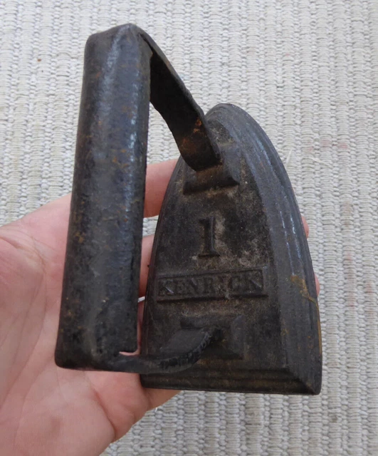 ANTIQUE FLAT IRON Victorian curved base for hats..maker stamped Kenrick ...