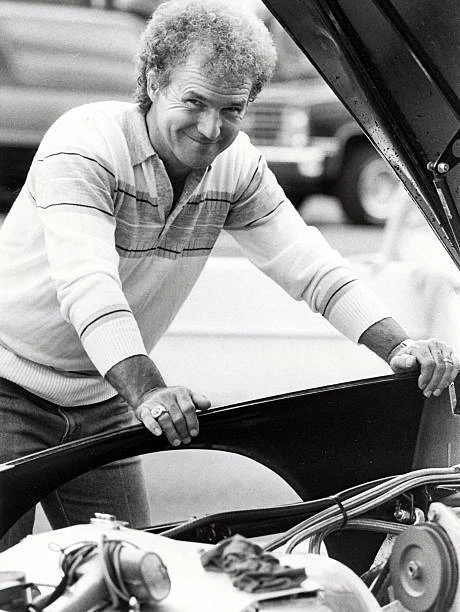 MORGAN SHEPHERD CHECKS out his engine before the Nationwise 500. Sh ...