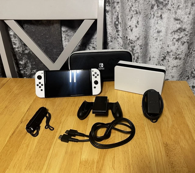 NINTENDO SWITCH OLED Model HEG-001 Handheld Console - 64GB - White £60. ...