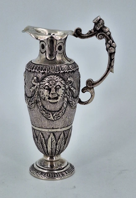 PETITE AIGUIÈRE EN argent massif sculptée, ciselée et poinçonnée de ...