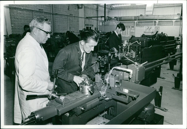A TRAINEE OPERATES a capstan lathe at the Norwi... - Vintage Photograph ...