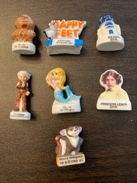 LOT DE 7 Fèves De Films. Arthur, Madagascar,Happy Feet, Starwars,R2 D2 ...