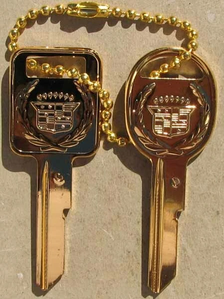 NOS GOLD CADILLAC LOGO KEY SET UNCUT IGNITION and TRUNK KEYS PRISTINE # ...