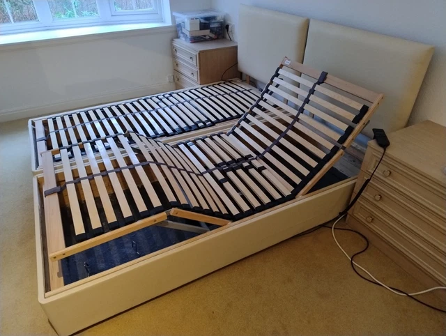 2 SINGLE ELECTRICALLY adjustable bed frames with matching frames and ...