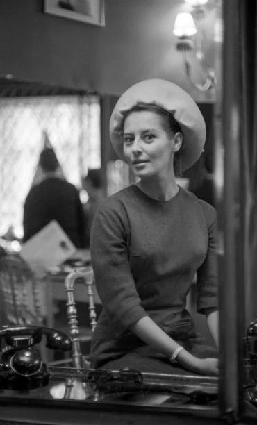 ZARINA RAHMAN DURING a fitting session at hat designer Jean Ba- 1962 ...