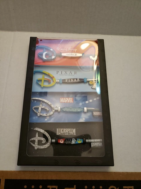 LOT DE 4 clés Disney Store Walt Disney Studios, Pixar Studios, Marvel ...