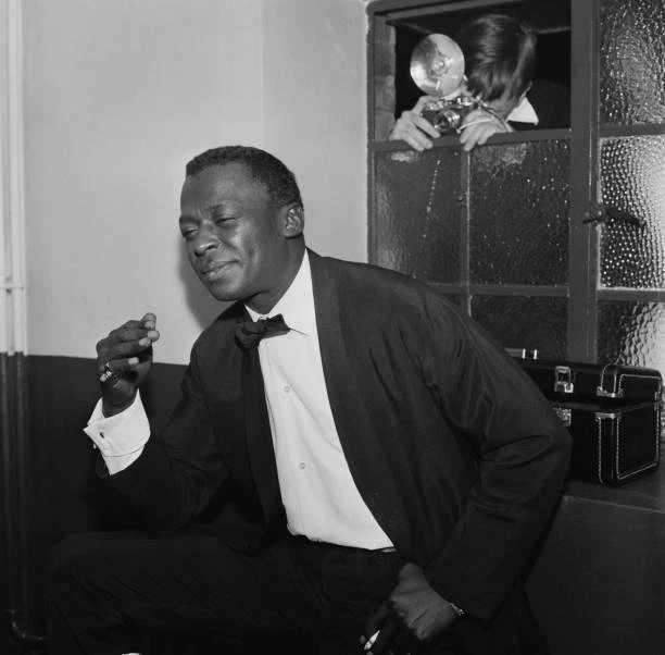 AMERICAN JAZZ TRUMPET player Miles Davis pictured backstage pr- 1960s ...