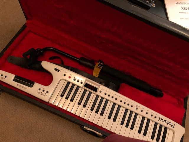 ROLAND AX-7 KEYTAR MIDI Controller with guitar stand, strap and case £ ...