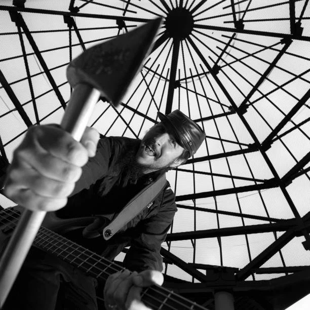 BAND PRIMUS BASSIST vocalist Les Claypool poses for a January 1998 ...