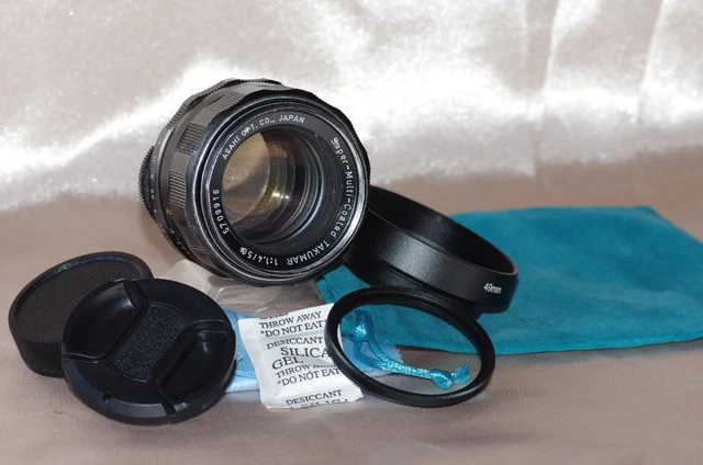 OBJECTIF M42 50MM f1,4 TAKUMAR SMC, avec bouchons, filtre, pare-soleil ...