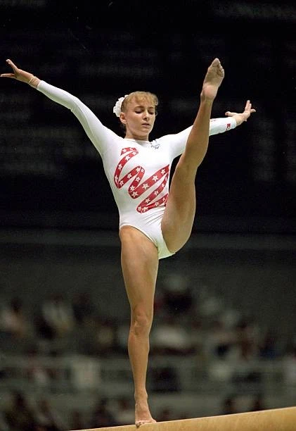 SHANNON MILLER USA moves on the balance beam during the World Gymn- Old ...