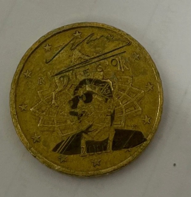 MONETA CON INCISO la firma e il volto di Diego Maradona mentre fuma il ...