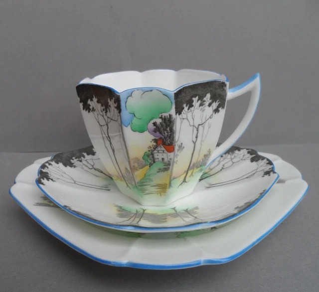 A SHELLEY ART Deco "Cottage & Trees" 11873 Queen Anne shape tea trio. C ...