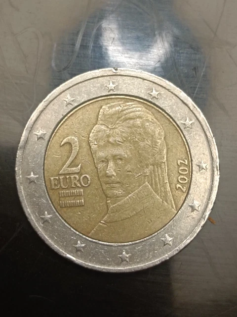PIECE RARE 2 euros De Collection pays ???? Et frappée sur la tranche ...
