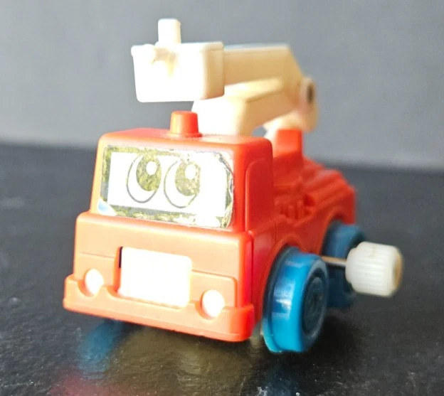 TOMY WIND UP Toy Firetruck. Extending Bucket. Red, White, Blue. £10.70 ...