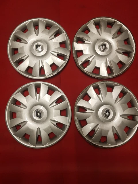 4 ENJOLIVEURS D'ORIGINE RENAULT en 15 pouces en Bon état mais pas neuf ...