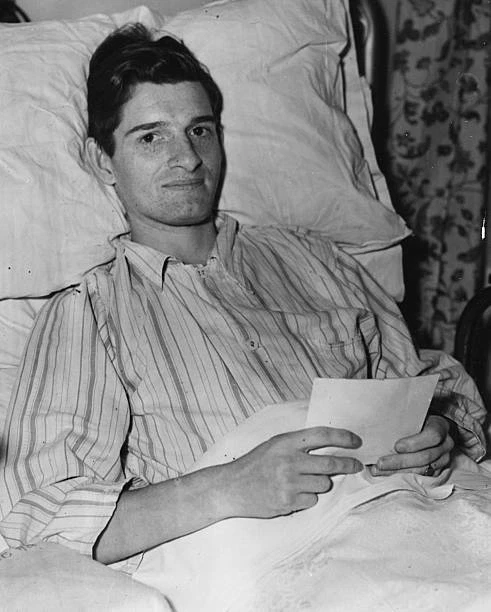KENNETH CAMPION PICTURED recovering hospital bed after receivin- 1957 ...