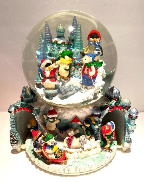 PENGUIN MUSICAL WATER Snow Globe Revolving Wind Up Moving Train Base £ ...