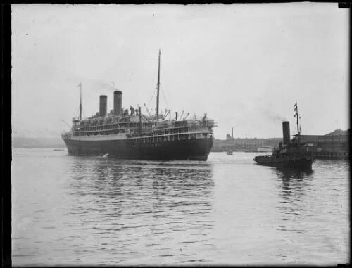 HMS OTRANTO BEING towed by a tug boat in a harbour, NSW, ca 1920s Old ...