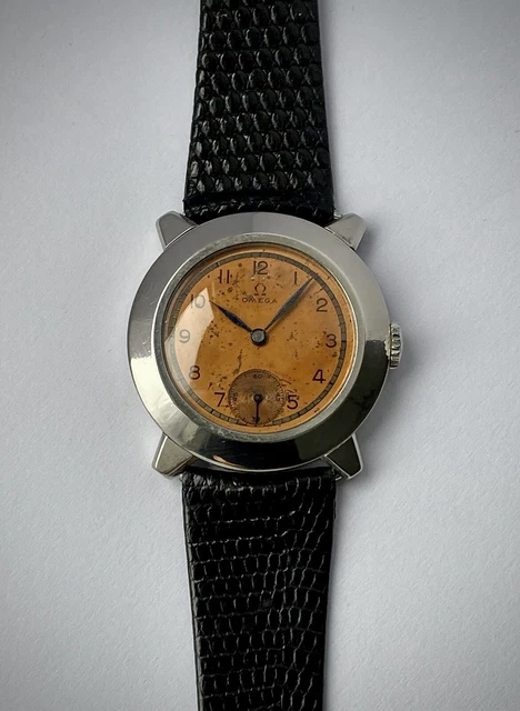 1939 OMEGA STEEL cased copper dial watch with unique Art Deco X lugs 26 ...