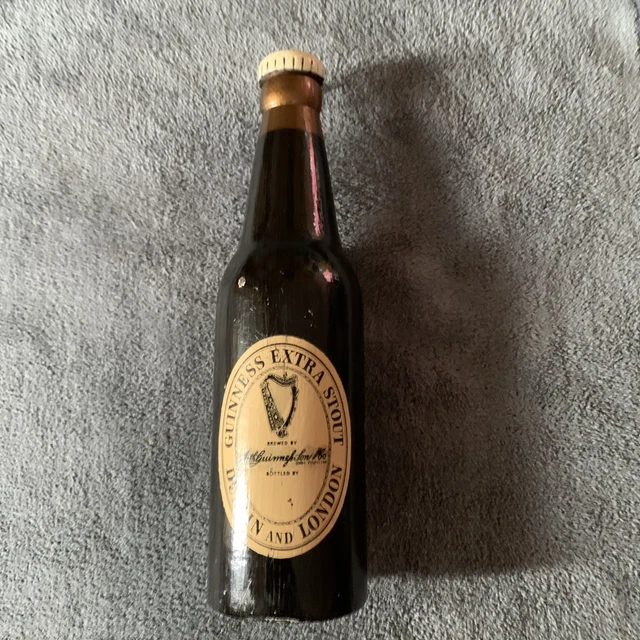 C1950S ERA GUINNESS EXTRA STOUT DUBLIN AND LONDON BOTTLE SHAPE ADV ...