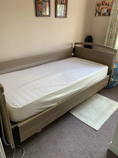 SINGLE ELECTRIC HI/LOW mobility/disabled bed with side Rails cost £4400 ...