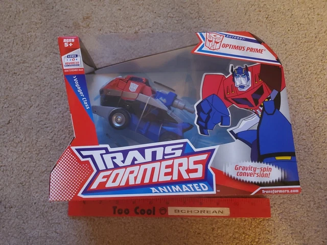 TRANSFORMERS ANIMATED VOYAGER Class Autobot Optimus Prime Insignia ...