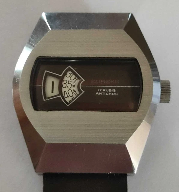 MONTRE MECANIQUE VINTAGE a guichet EUREKA 1970 calibre HS 238 ADI ...