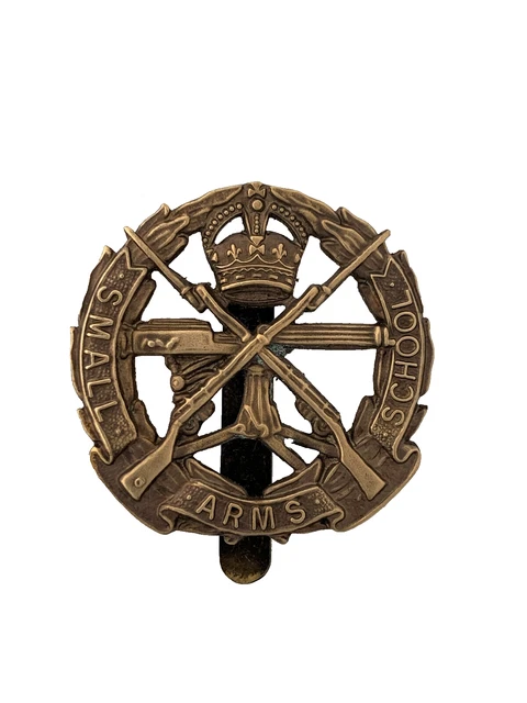 BRITISH ARMY SMALL Arms School metal cap badge. ANTIQUED brass army cap ...