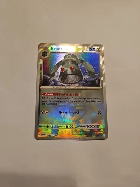 POKÉMON TCG BRONZONG Prismatic Evolutions 067/131 Pokeball Reverse Holo ...