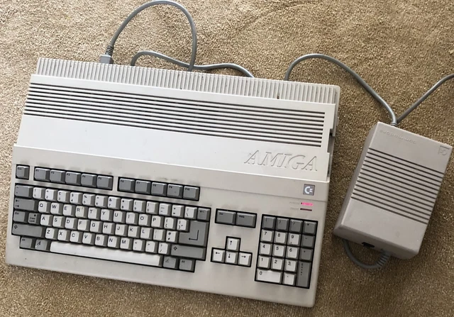COMMODORE AMIGA 500 - Boxed - With various accessories Powers up. £130. ...