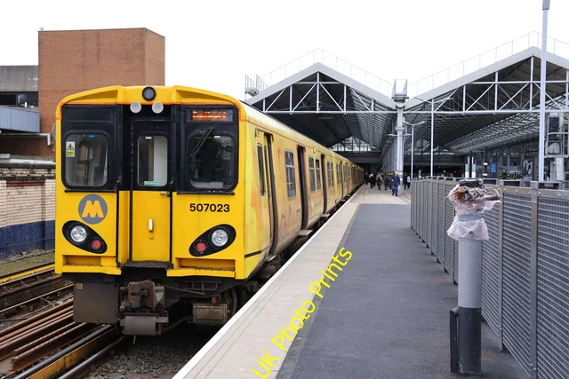 PHOTO RAILWAY 12X8 Class 507 EMU 507023 waits to depart Southport c2023 ...