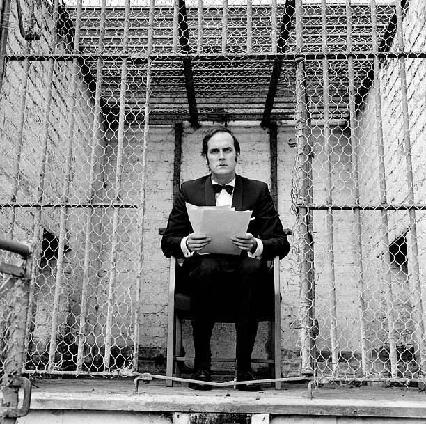 ENGLISH ACTOR WRITER And Comedian John Cleese Filming A Sketch 1970 OLD ...