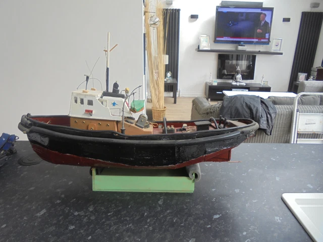 2 TUG BOATS remote control no inards basic shell very old colection ...