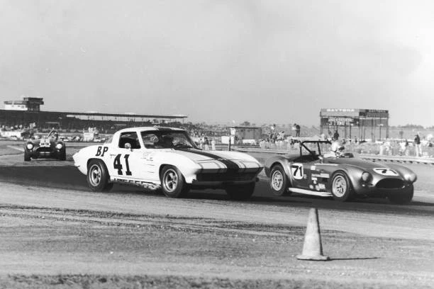 SHELBY COBRA LEADS A Chevrolet Corvette During Scca Racing Old Racing ...