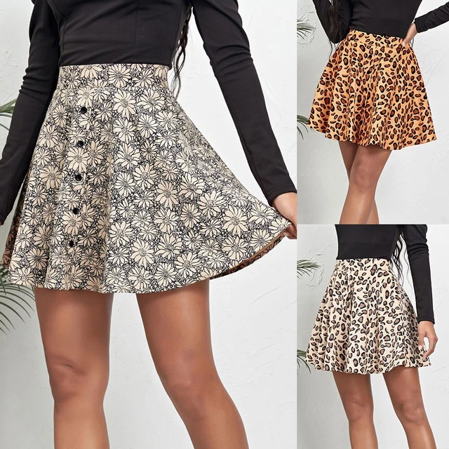 BELLES JUPES À plusieurs niveaux au design fluide disponibles en beige ...