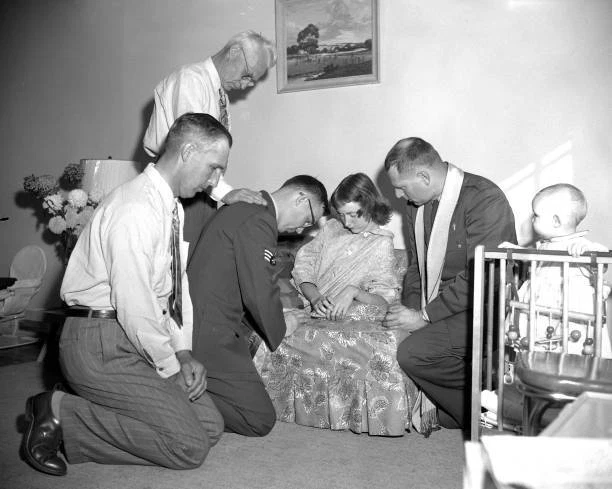 SGT JERRY DAMMAN and his wife Marilyn pray with friends after the ...
