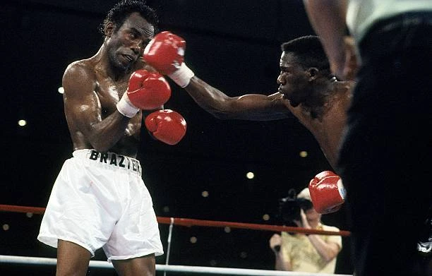 ROGER MAYWEATHER THROWS A Punch V Harold Brazier Old Boxing Photo $8.50 - PicClick AU