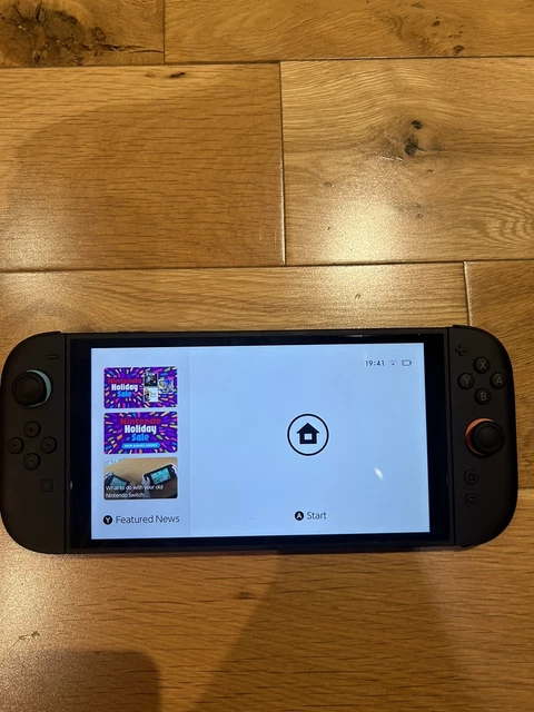 NINTENDO SWITCH 2 All works fine minor damage too joycon and couple ...