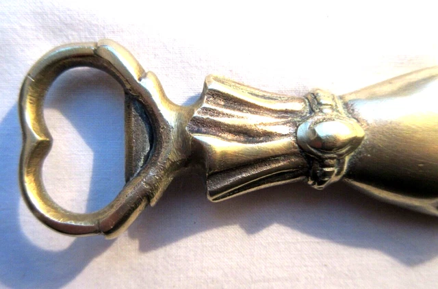 DÉCAPSULEUR ART DÉCO, Vintage, bronze doré: Main gantée avec bracelet ...