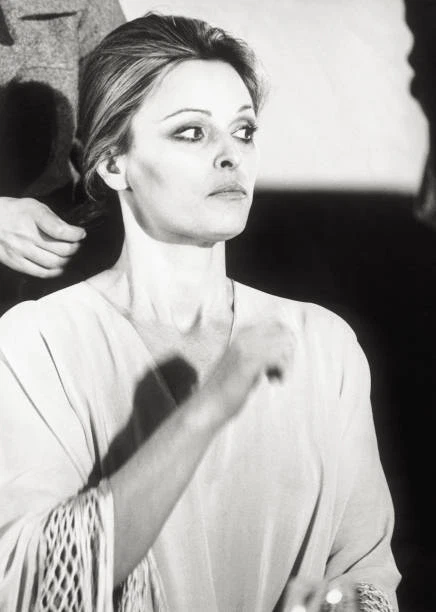 ITALIAN ACTRESS LUCIA Bose is wearing a white scene costume and is ...