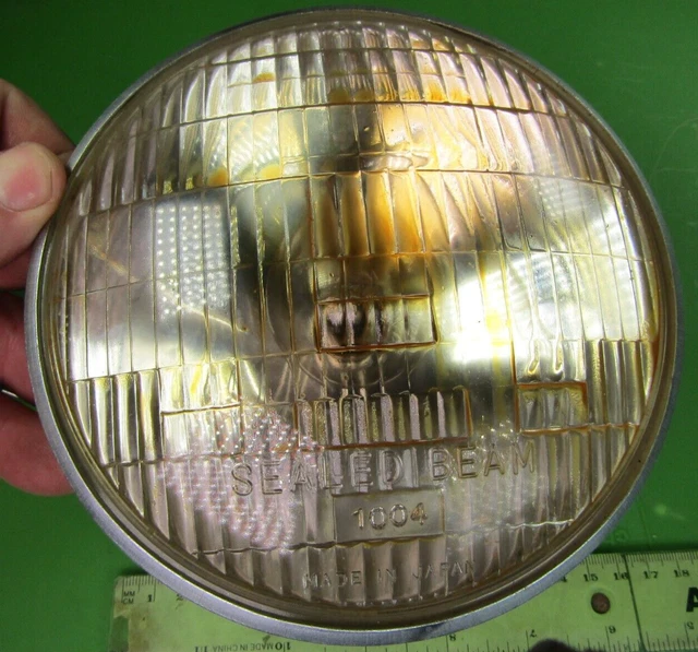 HONDA SPORT 250 Headlight 6v 35/25 watt🔥6 1/2" od🔥Has Yellow stuff ...