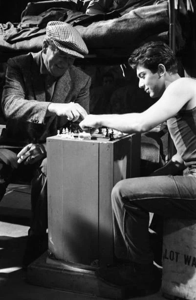 JOHN WAYNE AND Paul Anka playing chess on the set of the movie- 1962 ...