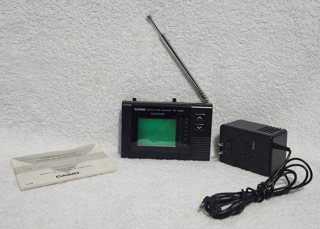 VINTAGE CASIO COLOR Mini Pocket Television Model TV-1200 W/AC Adapter ...