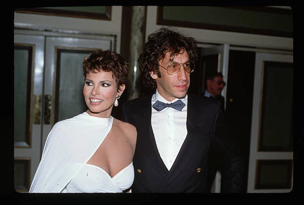 RAQUEL WELCH AND photographer Andre Weinfeld are shown as they app- Old ...