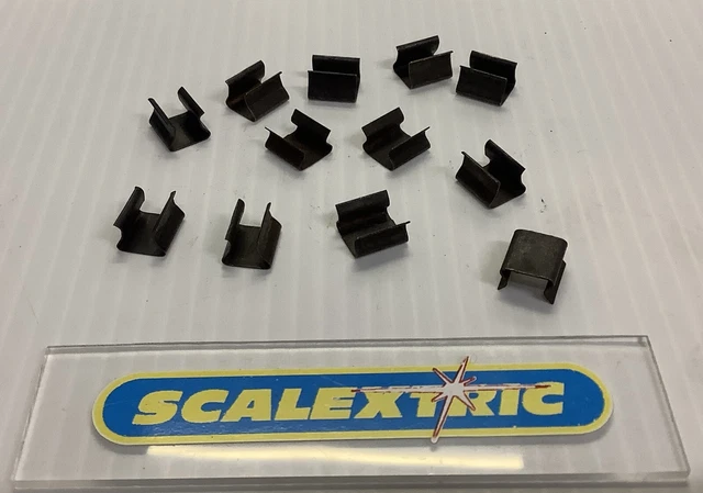 12 X SCALEXTRIC TRI-ANG EARLY 1960s S122 METAL TRACK FIXING CLIPS ...