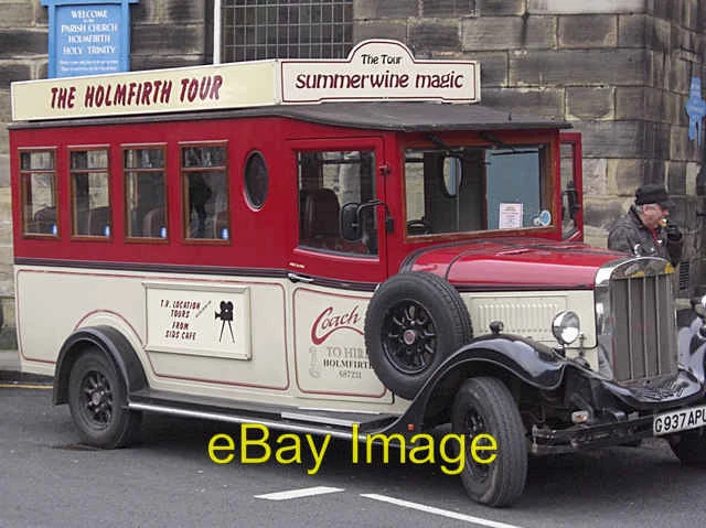 PHOTO 6X4 ALL aboard for Compo's grave Holmfirth This old bus waits on ...