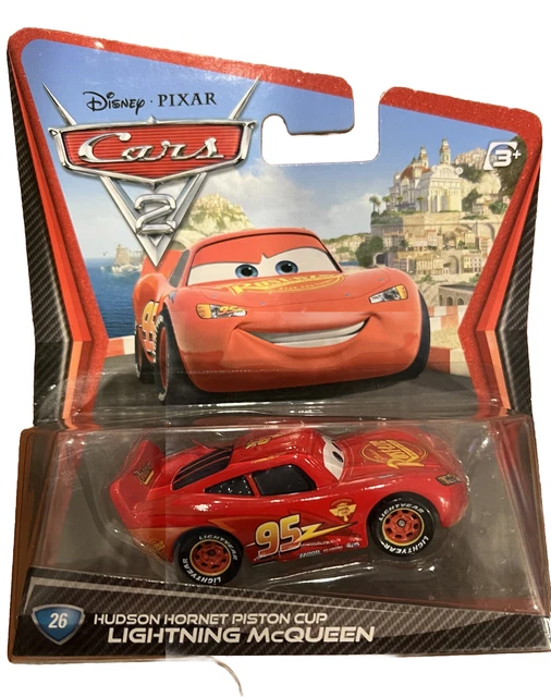 DISNEY PIXAR CARS 2 LIGHTNING MCQUEEN HUDSON HORNET COUPE PISTON #26 ...
