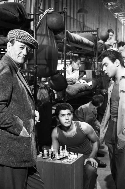JOHN WAYNE AND Paul Anka playing chess on the set of the movie- 1962 ...