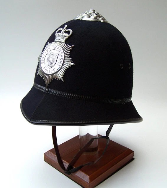 C.1970S BRITISH TRANSPORT POLICE HELMET C/W BADGE & CHINSTRAP £76.00 ...